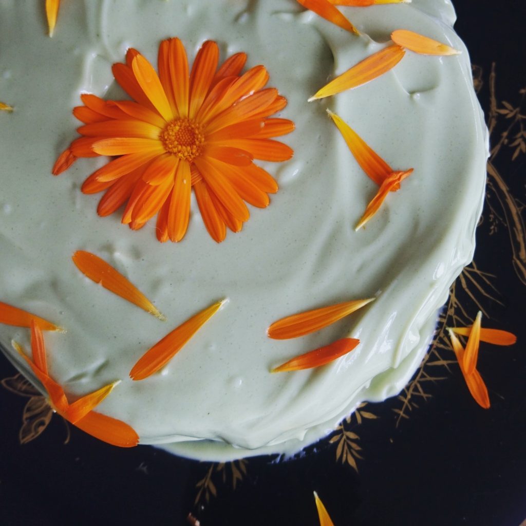A cake for spring: Malty sponge cake with matcha icing and marigolds ...